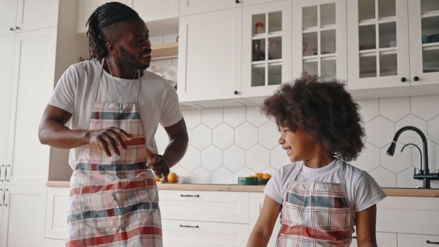 Man Singing into Spatula and Dancing in Kitchen • Stock Video on Uppbeat
