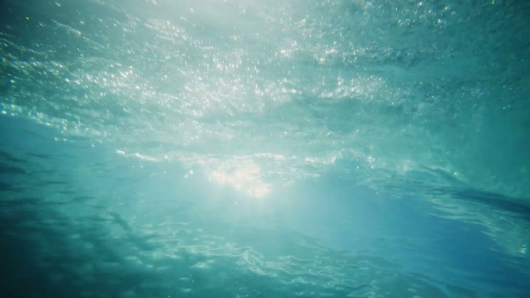 Underwater Sun Rays Through Ocean Waves • Stock Video on Uppbeat