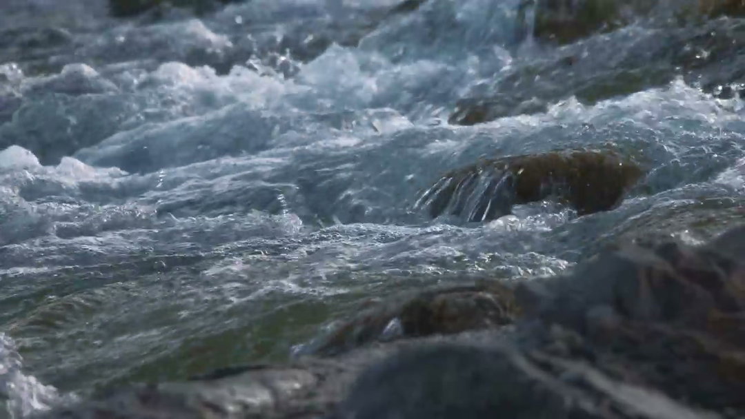 Water Flowing Over Rocks in Slow Motion • Stock Video on Uppbeat