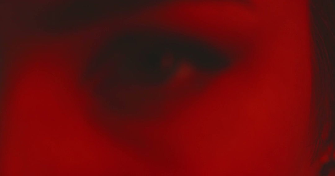 Intense Eyes Defocusing in Red Light • Stock Video on Uppbeat
