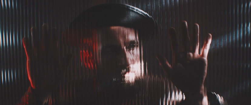 Man with Fedora Filming with Vintage Camera • Stock Video on Uppbeat