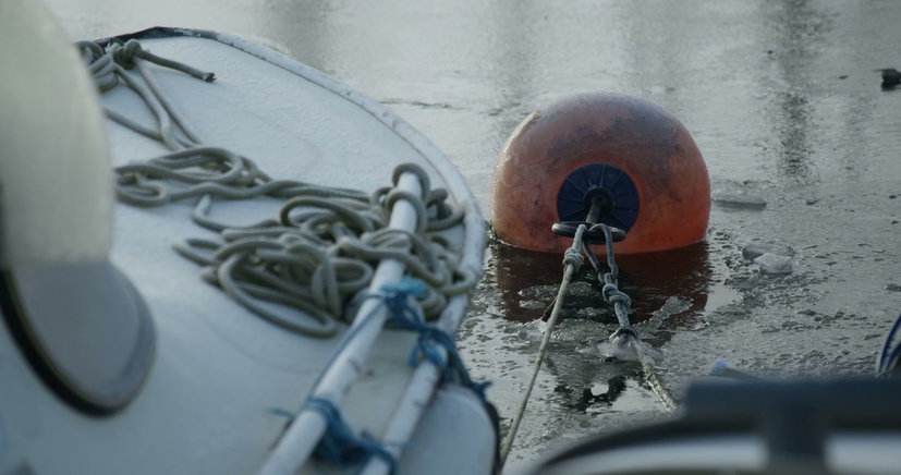 Water Ripples by a Wooden Dock with Boat • Stock Video on Uppbeat