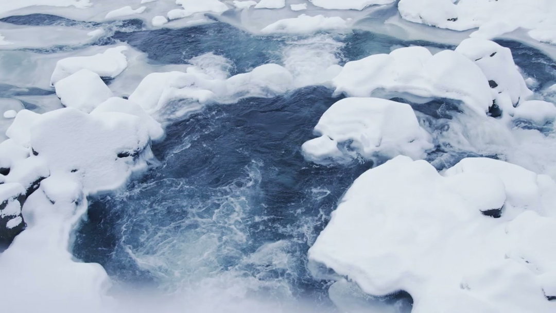 Frozen Waterfall with Flowing Water in Winter • Stock Video on Uppbeat