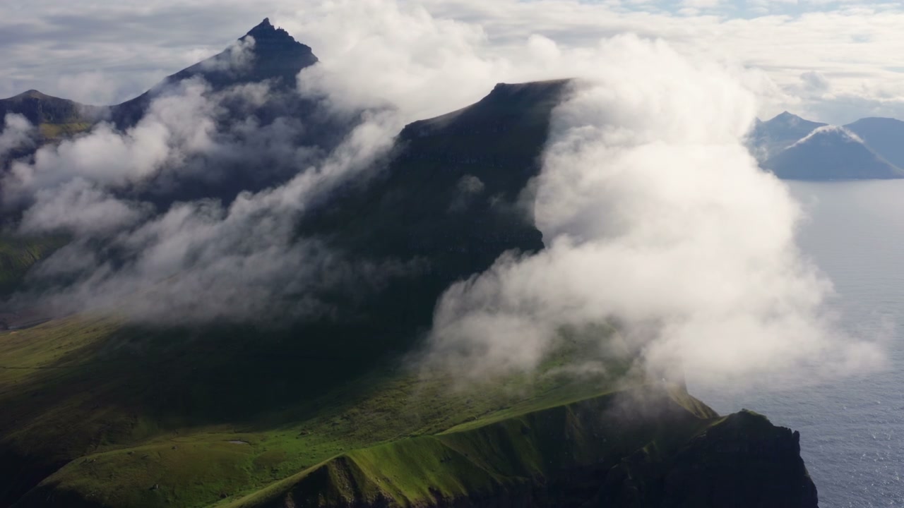 Kallur Lighthouse on Kalsoy Island in Fog • Stock Video on Uppbeat