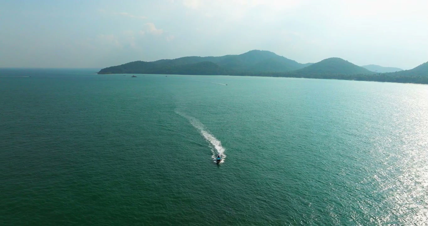 Longtail Boat Cruising Tropical Cliffs in Thailand • Stock Video on Uppbeat