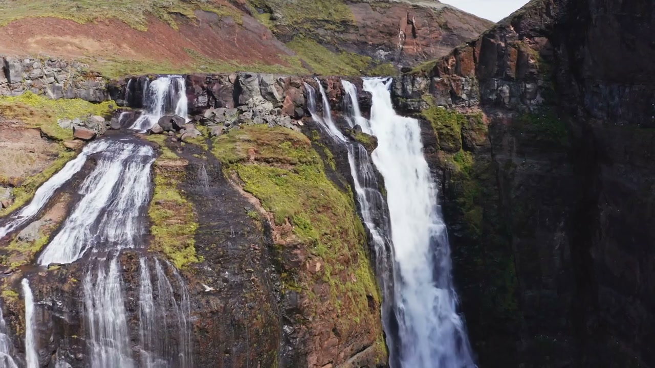 Glymur Waterfall in Rugged Icelandic Landscape • Stock Video on Uppbeat