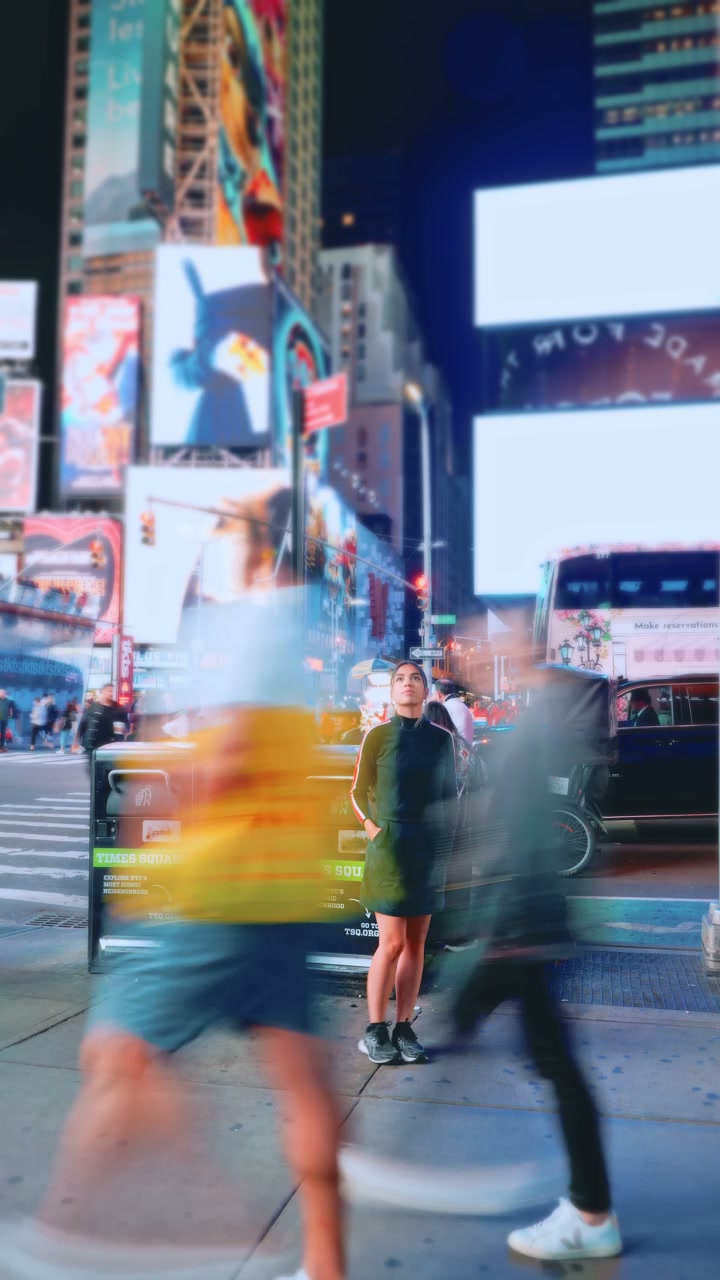 Couple Holding Hands in Times Square • Stock Video on Uppbeat