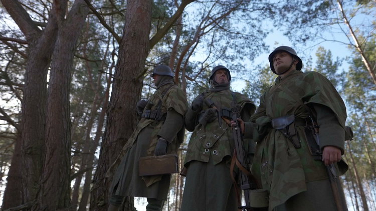 World War II Soldiers Patrolling Through Forest • Stock Video on Uppbeat