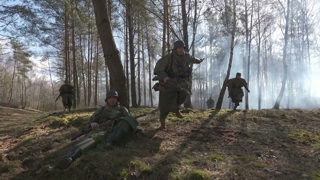 World War II Soldiers Patrolling Through Forest • Stock Video on Uppbeat