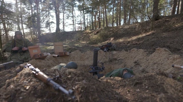 Soldiers Firing Mortar in a Winter Trench • Stock Video on Uppbeat