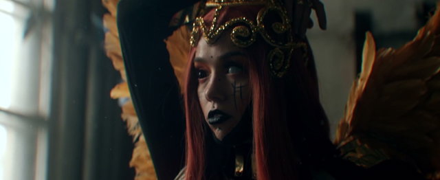 Ethereal Figure with Golden Wings and Crown • Stock Video on Uppbeat