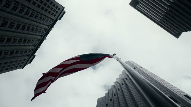 American Flag Waving on City Building Fire Escape • Stock Video on Uppbeat