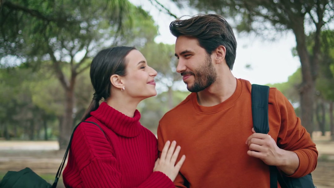 Couple Leaning Against Tree in Forest • Stock Video on Uppbeat