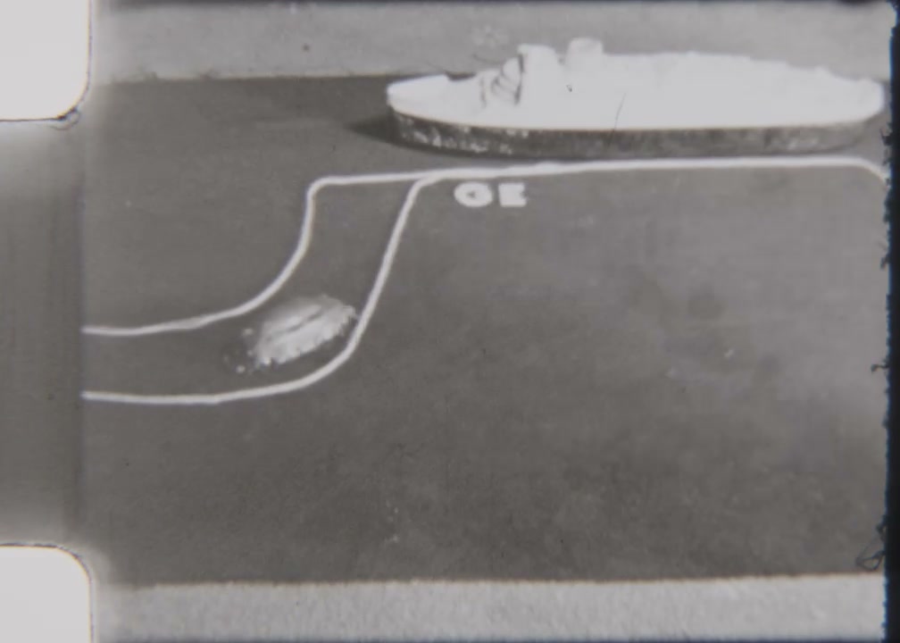 Vintage Stop Motion Toy Car Driving Past Triest • Stock Video on Uppbeat