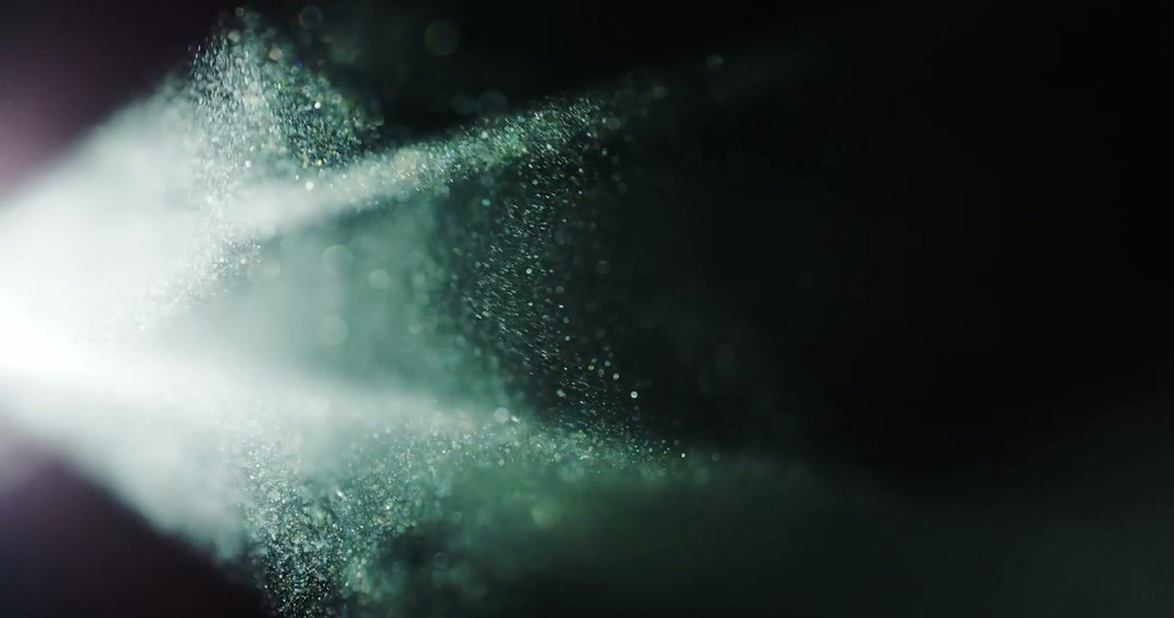 Golden Dust Particles Floating in Light Beam • Stock Video on Uppbeat