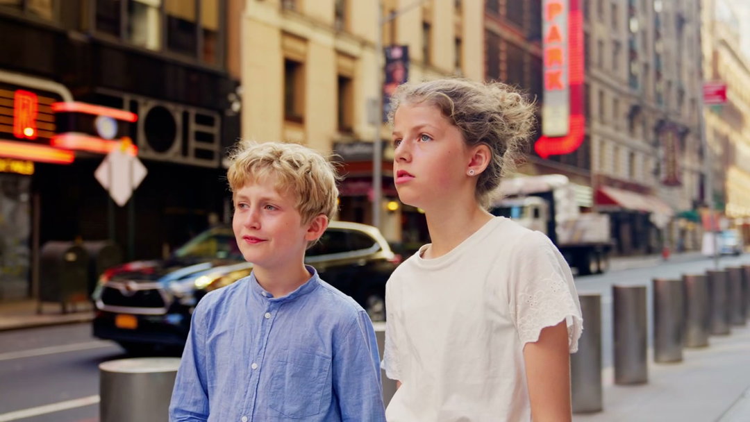 Boy Walking on New York City Street • Stock Video on Uppbeat
