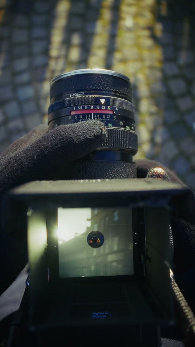 First-Person View Adjusting Analog Camera Focus • Stock Video on Uppbeat
