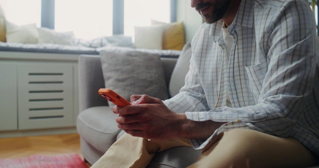 Bearded Man Using Smartphone • Stock Video on Uppbeat