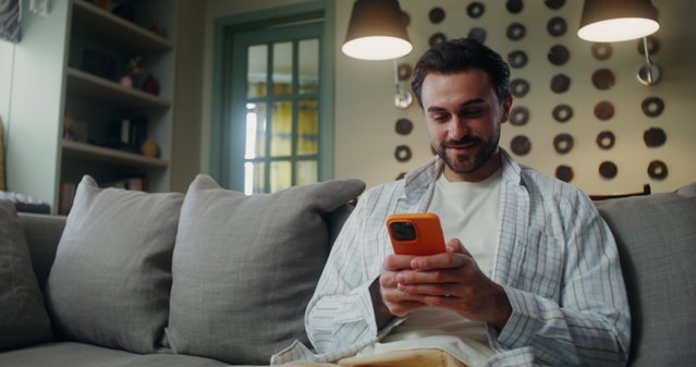 Bearded Man Using Smartphone • Stock Video on Uppbeat
