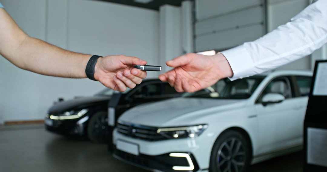 Car Dealership Key Handover and Handshake • Stock Video on Uppbeat