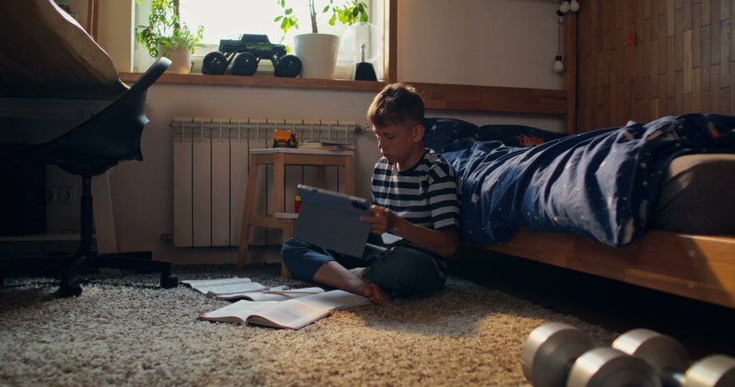 Student Doing Homework on Bed with Laptop • Stock Video on Uppbeat