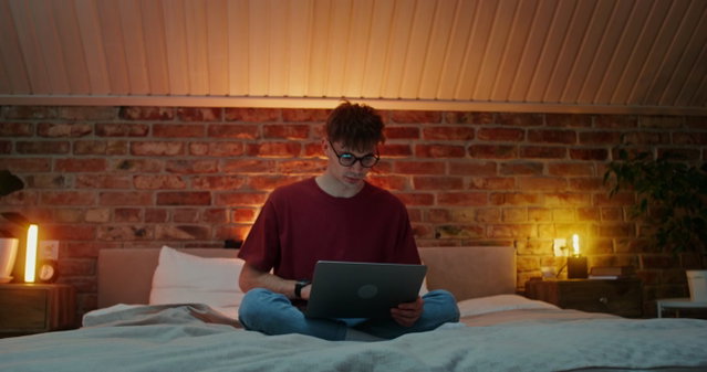 Man Falling Backwards Onto Bed • Stock Video on Uppbeat