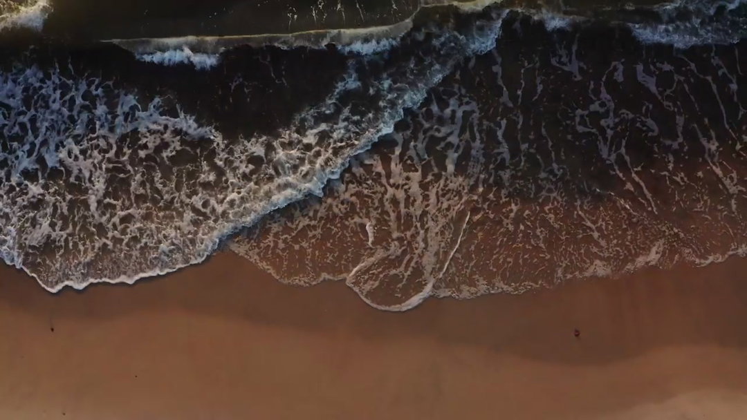 Golden Hour Over Mountain Range with Clouds • Stock Video on Uppbeat