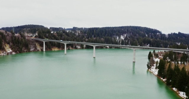Camper Van Crossing Bridge Over Green Lake • Stock Video on Uppbeat