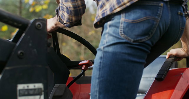 Small Red Tractor with Front Loader and Tiller • Stock Video on Uppbeat